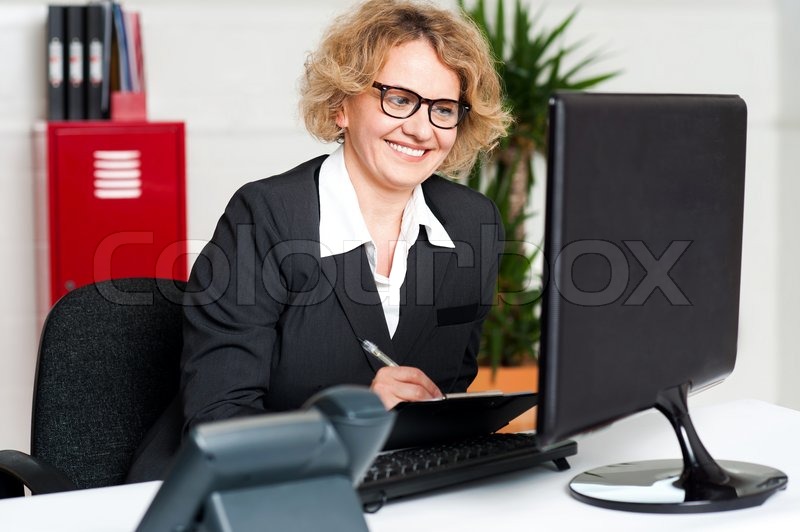 Its time to work. Front desk lady ... | Stock image | Colourbox