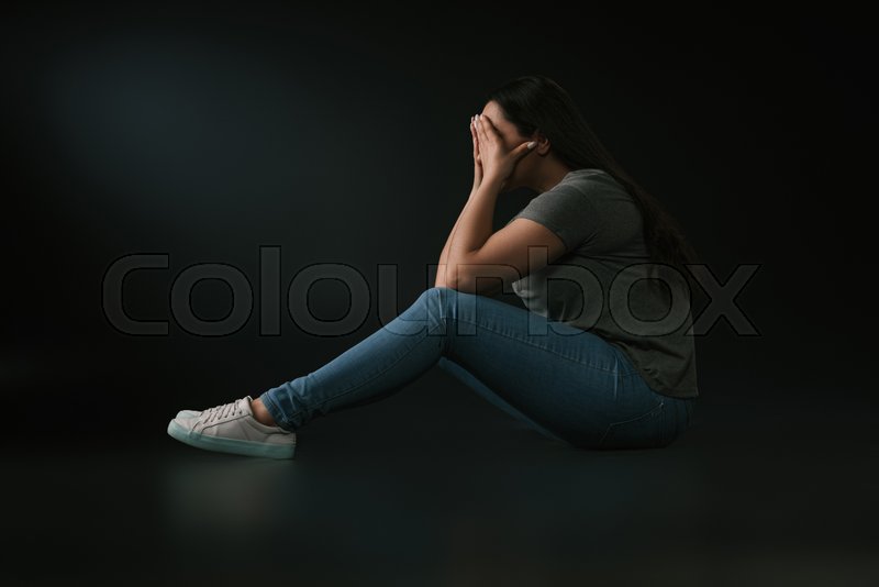 Side view of crying plus size girl ... | Stock image | Colourbox