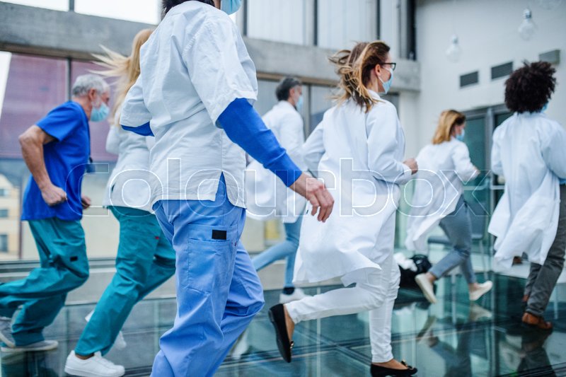 Group of doctors in hurry running in ... | Stock image | Colourbox
