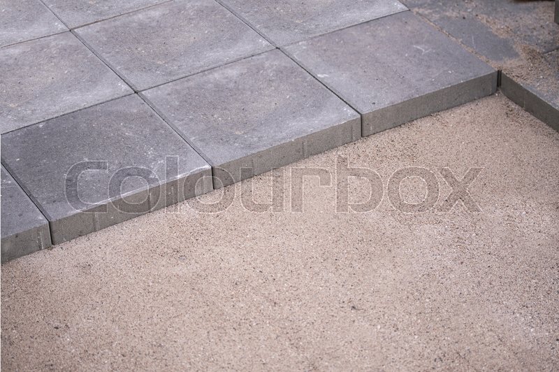 Rows of concrete square pavers or tiles ... | Stock image | Colourbox