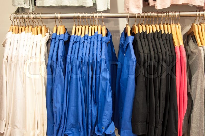 Fashion clothing on hangers | Stock Photo | Colourbox