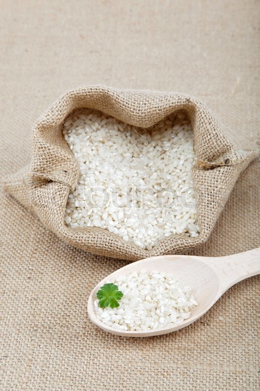 Rice in a bag on sacking | Stock image | Colourbox