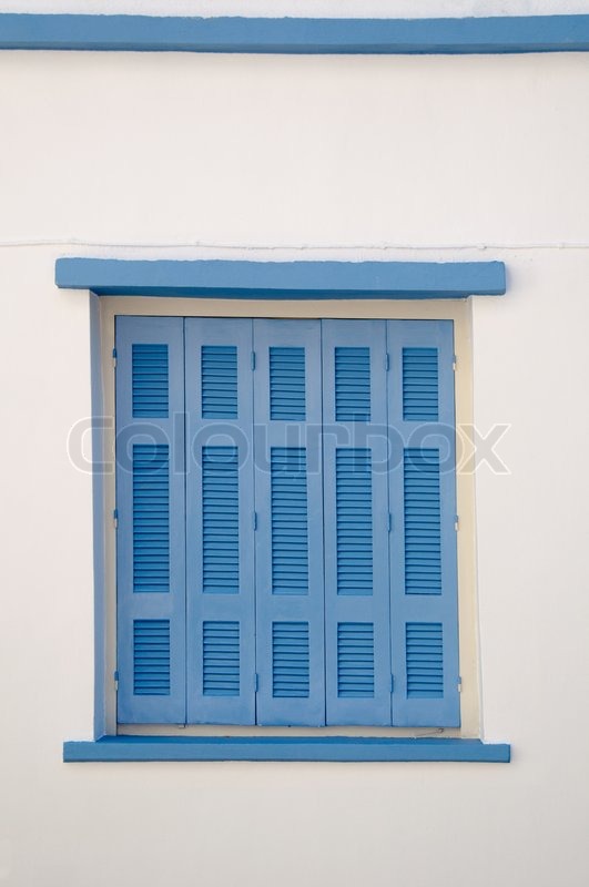 Greek blue window shutters | Stock image | Colourbox