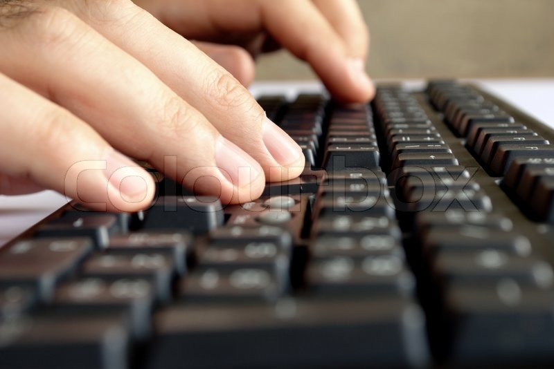 Keyboard and hand | Stock image | Colourbox