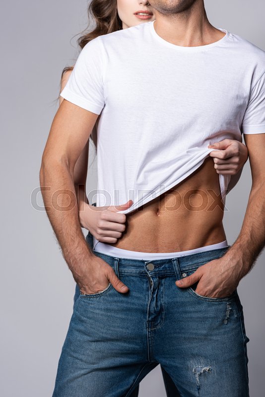 Woman Touching Mans Abs