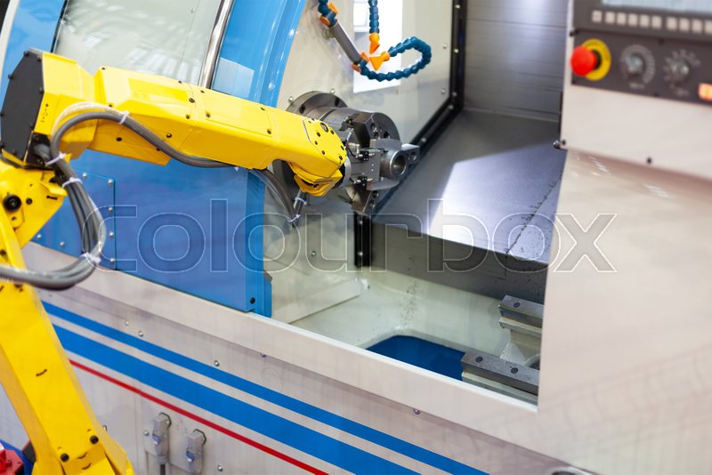Robotic arm with CNC lathe machine | Stock image | Colourbox