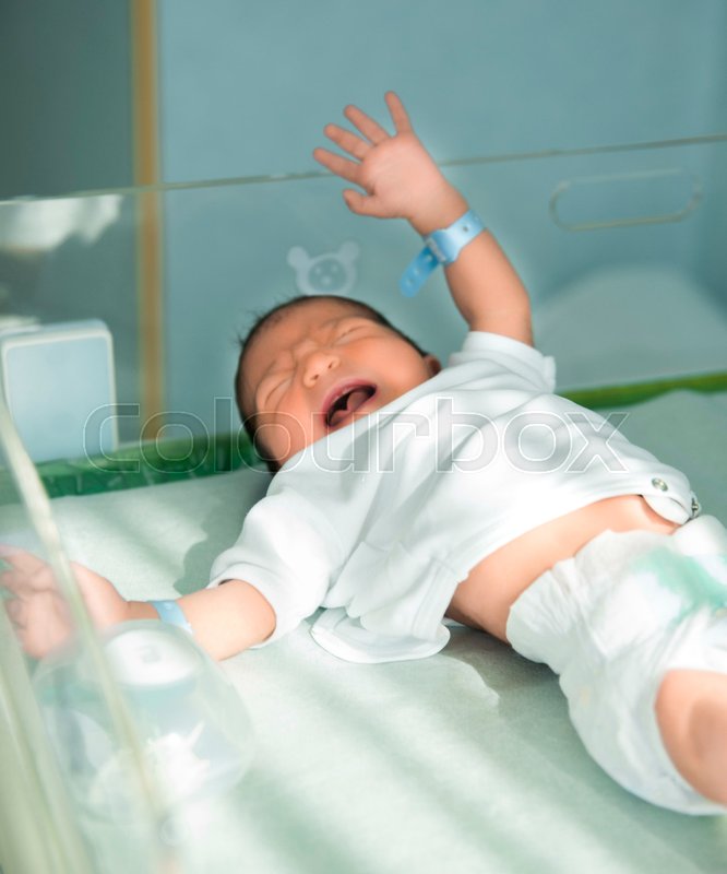 Crying newborn at the hospital unit | Stock image | Colourbox