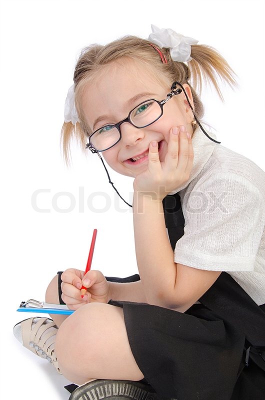 Little girl writing with pencils | Stock image | Colourbox