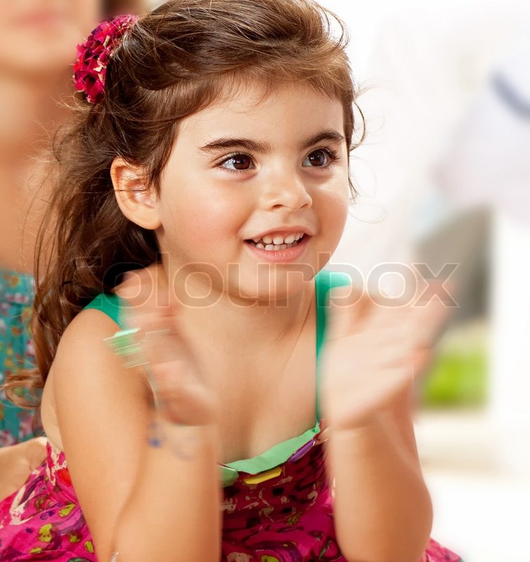 Little clapping baby girl | Stock image | Colourbox