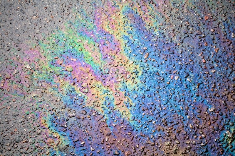 Background texture of an oil spill on ... | Stock image | Colourbox