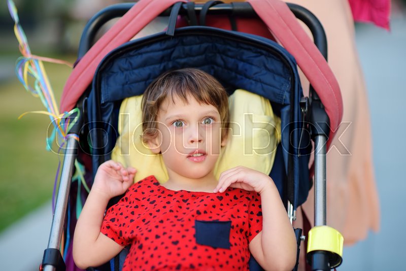 Portrait of a cute little disabled girl ... | Stock image | Colourbox