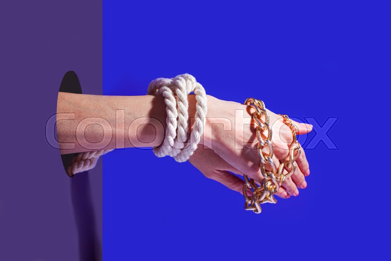 Close up pair of woman hands tied by ... | Stock image | Colourbox