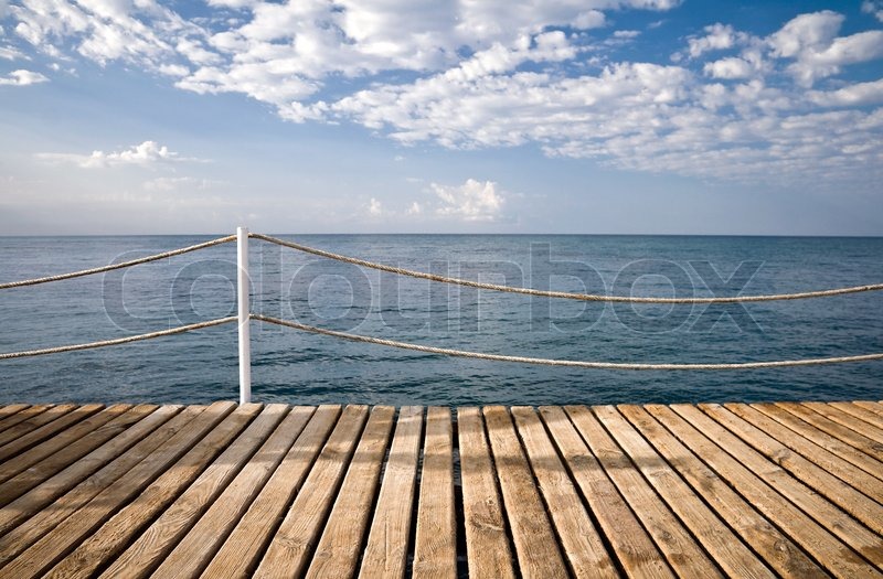 : On the wooden pier with railings ... | Stock image | Colourbox