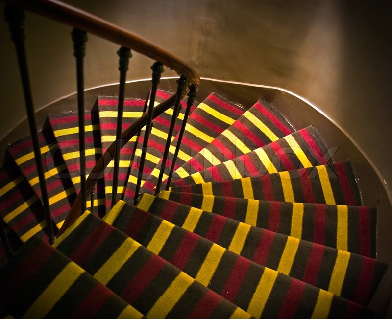 Footsteps with carpet on spiral ladder ... | Stock image | Colourbox
