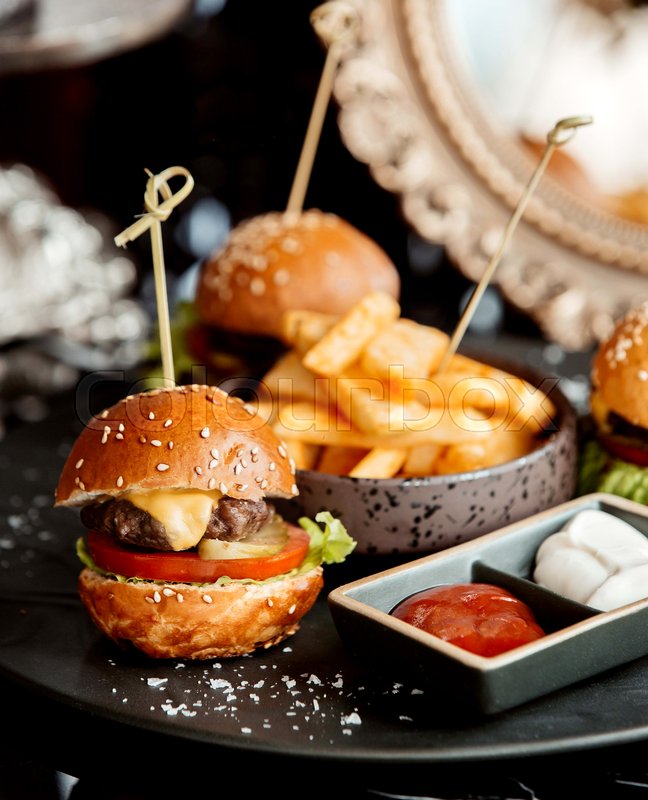 Close up of mini beef burger served ... | Stock image | Colourbox