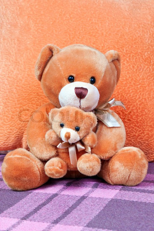 Cute baby plush toys - a bear holds in ... | Stock image | Colourbox