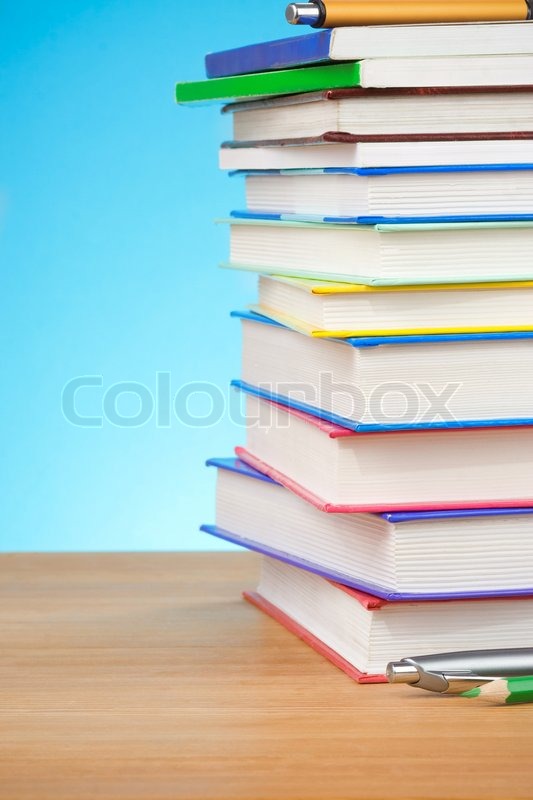 Pile of books and pens | Stock image | Colourbox
