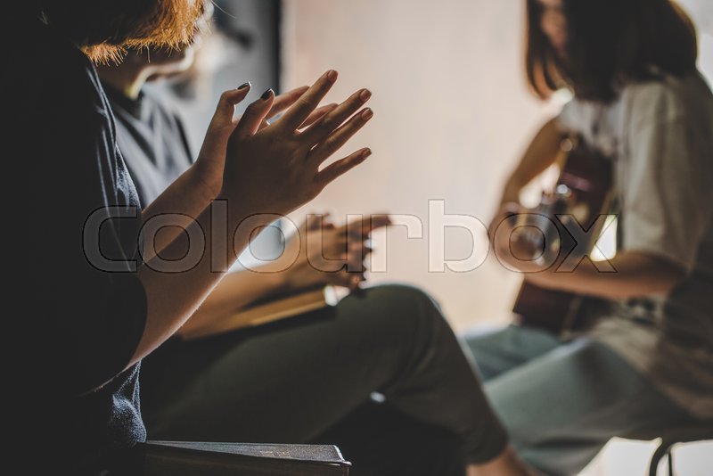 Three people pray and praising God ... | Stock image | Colourbox