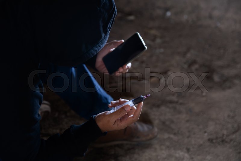 Man is drug dealer. Man call up sells ... | Stock image | Colourbox