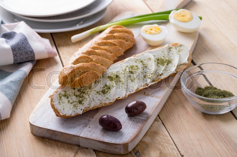 Freshly baked bread bun cut in halves ... | Stock image | Colourbox