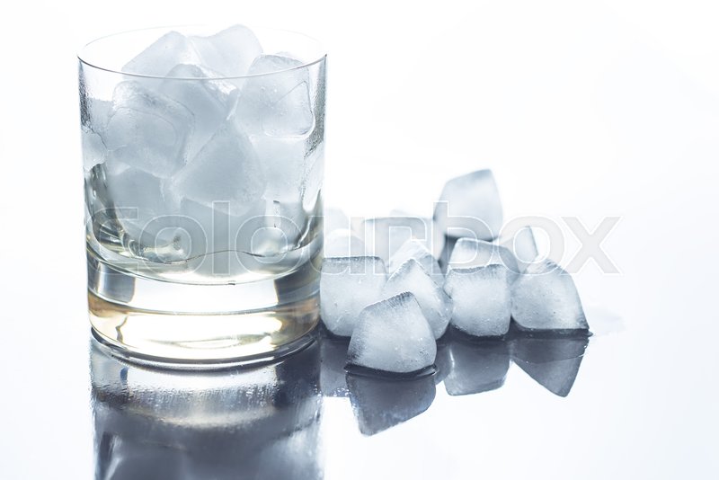 Cold ice cubes in glass. | Stock image | Colourbox