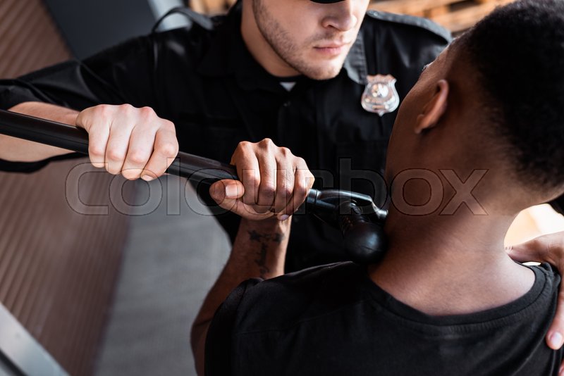 Cropped view of angry police officer ... | Stock image | Colourbox