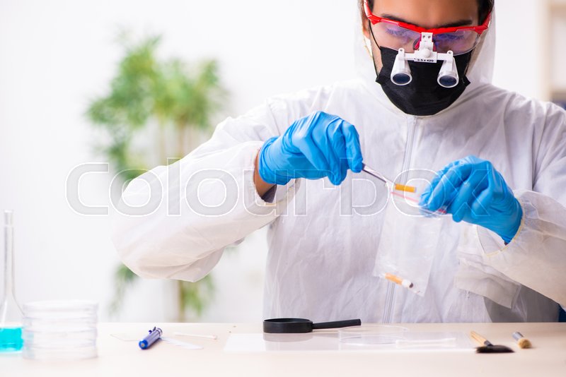 Male expert criminologist working in ... | Stock image | Colourbox
