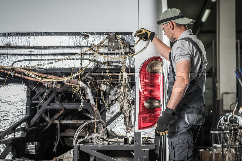 Caucasian Bus Service Technician in His ... | Stock image | Colourbox