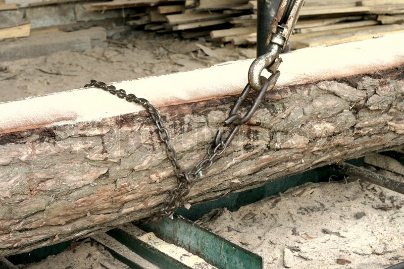 Large industrial Chain on a Log | Stock image | Colourbox