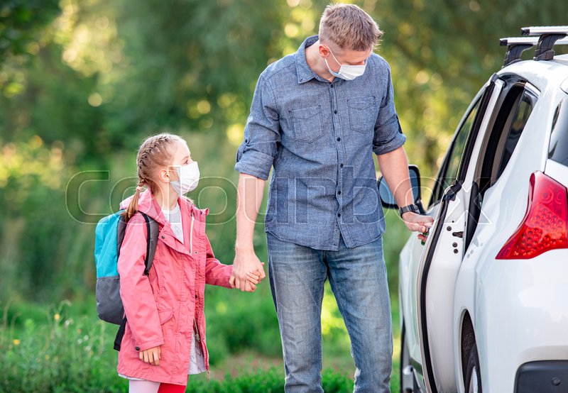Father driving daughter back to school ... | Stock image | Colourbox