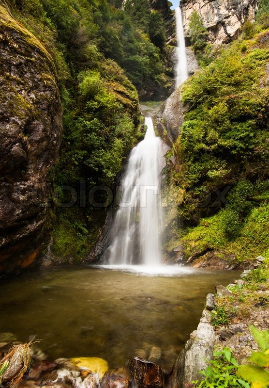 Waterfall in Himalayas: beautiful ... | Stock image | Colourbox