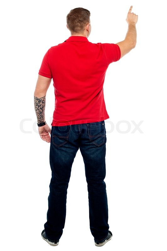 Back pose of man pointing at copy space ... | Stock image | Colourbox