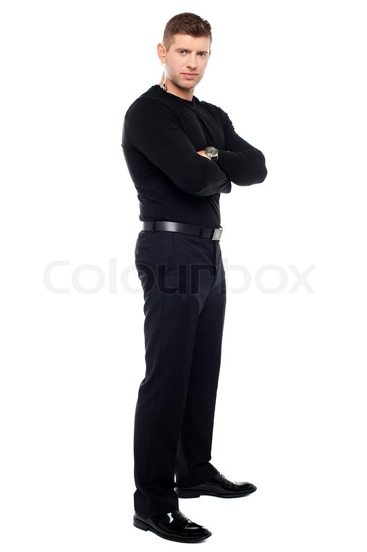 Handsome young bodyguard, full length ... | Stock image | Colourbox