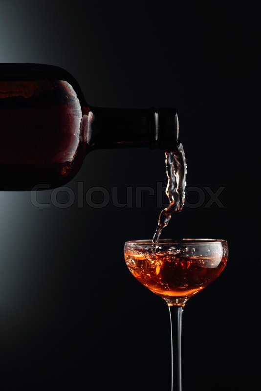 Strong golden alcoholic drink from the ... | Stock image | Colourbox