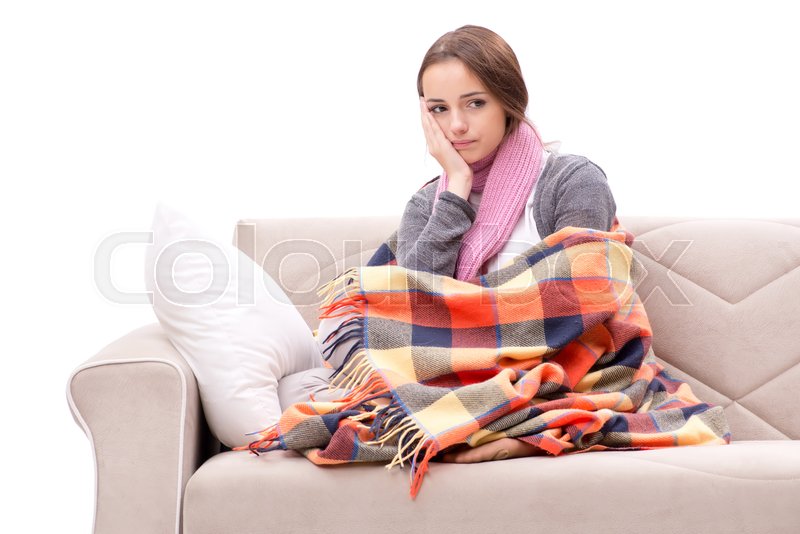 Teenager suffering from cold sitting on ... | Stock image | Colourbox