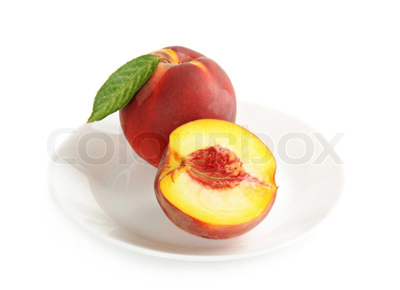 Single fresh ripe peach on the dish | Stock Photo | Colourbox
