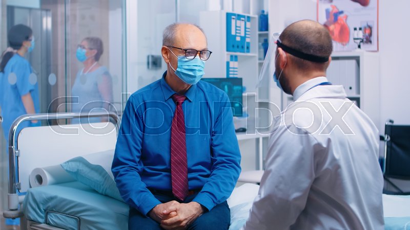 Doctor explaining to the patient the ... | Stock image | Colourbox