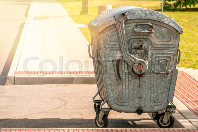 Metal container for garbage on the ... | Stock image | Colourbox