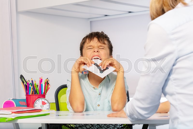Autistic child bite card expressing ... | Stock image | Colourbox