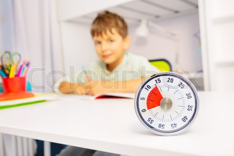 Timer and little boy during development ... | Stock image | Colourbox