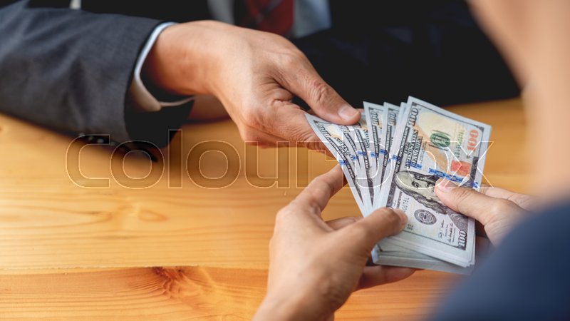 Businessman reciving money United ... | Stock image | Colourbox