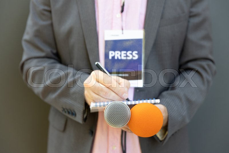 Journalist at press conference or media ... | Stock image | Colourbox