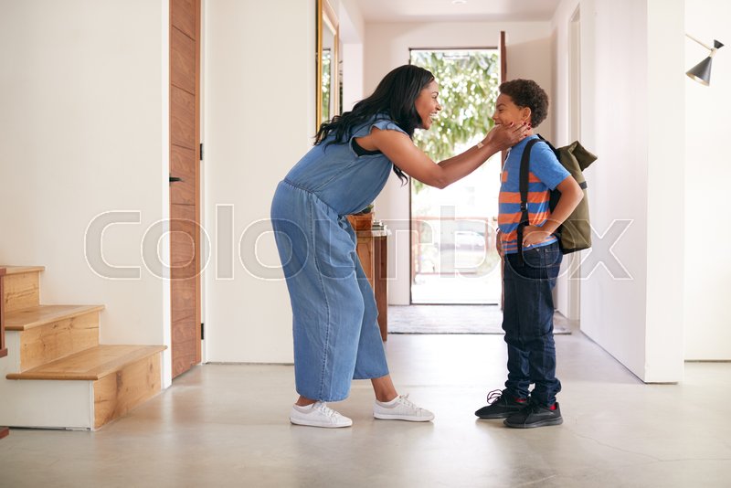 Mother Saying Goodbye To Son As He ... | Stock image | Colourbox