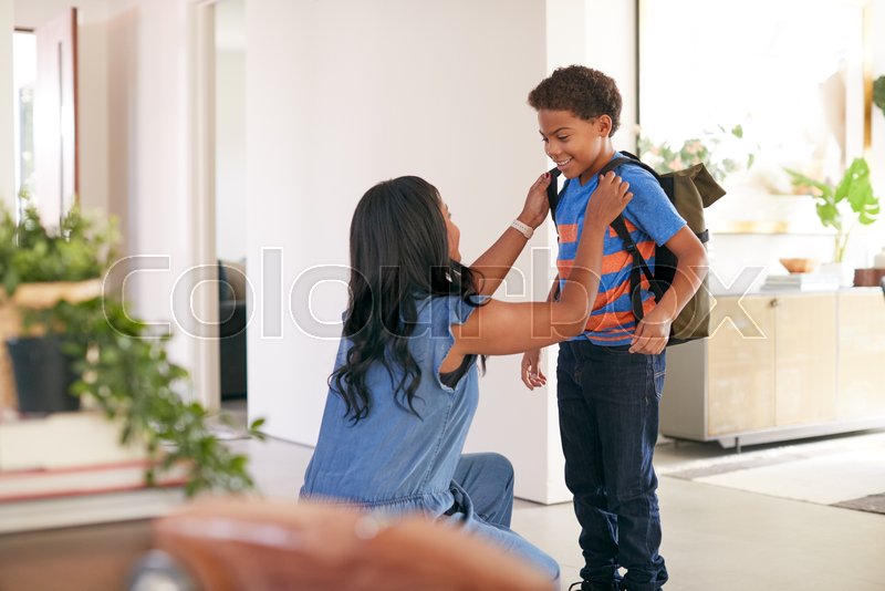 Mother Saying Goodbye To Son As He ... | Stock image | Colourbox