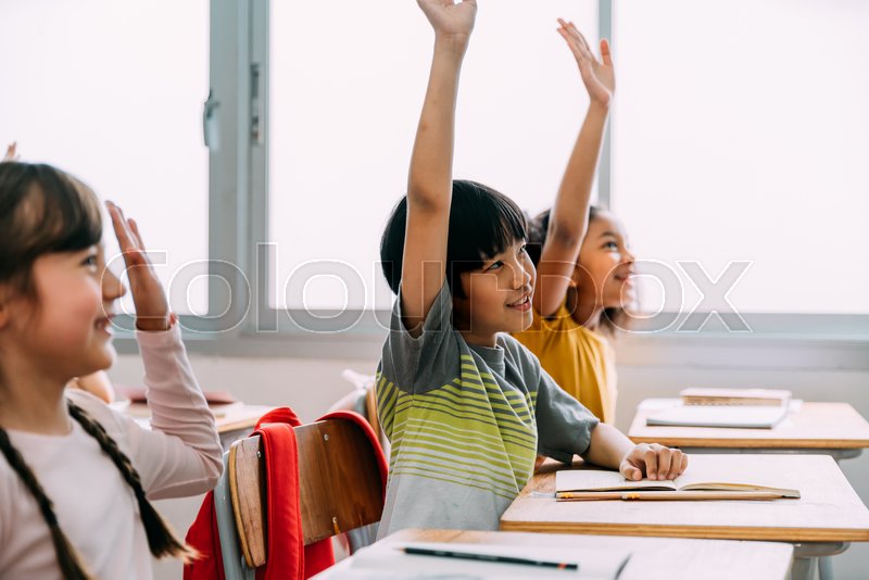 Elementary Students Raising Their Hands