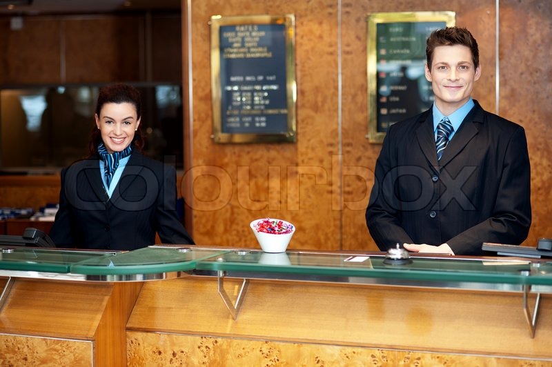 Front desk colleagues posing for a ... | Stock image | Colourbox