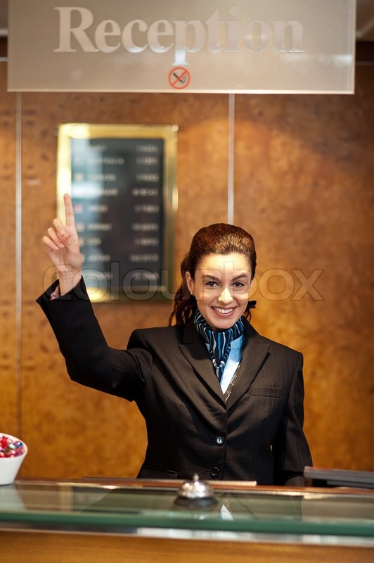 Beautiful female receptionist ... | Stock image | Colourbox