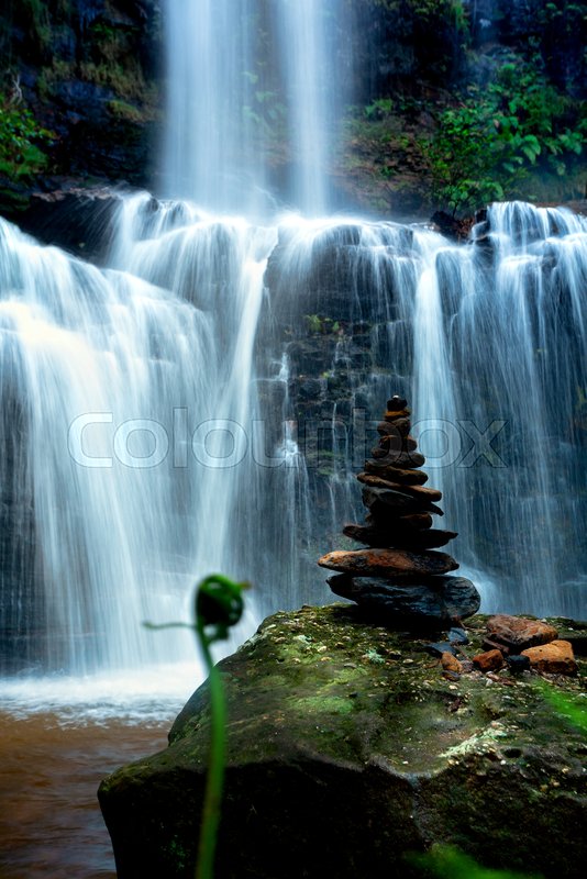 Zen waterfall with lush foliage and ... | Stock image | Colourbox