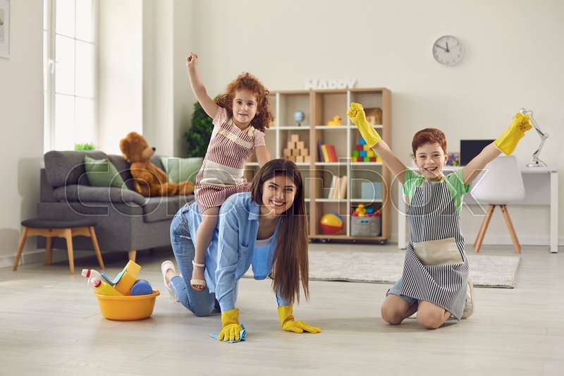 Happy family cleans room gloved. ... | Stock image | Colourbox