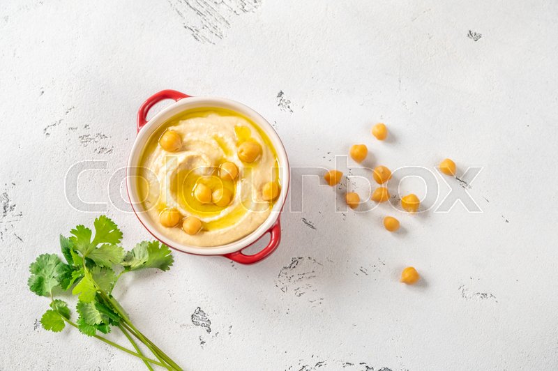 Bowl of traditional hummus with fresh ... | Stock image | Colourbox